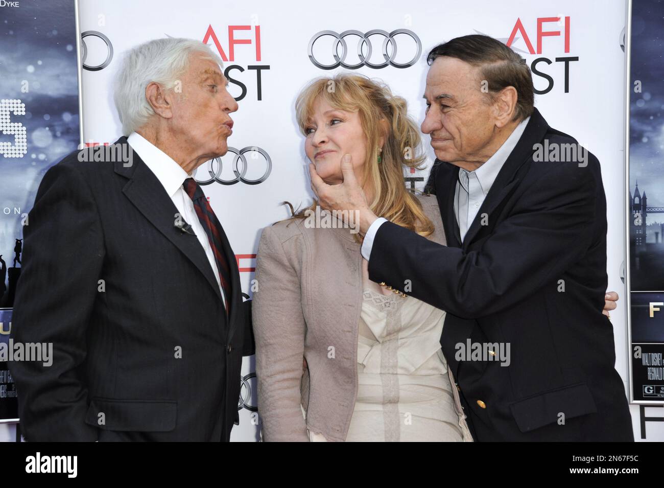 From left, Dick Van Dyke, Karen Dotrice, and Richard Sherman arrive at ...