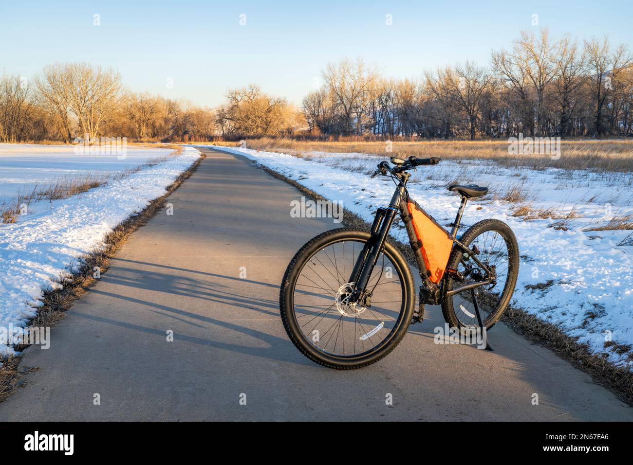 mountain bike on Poudre River Trail near Windsor in Colorado, winter ...