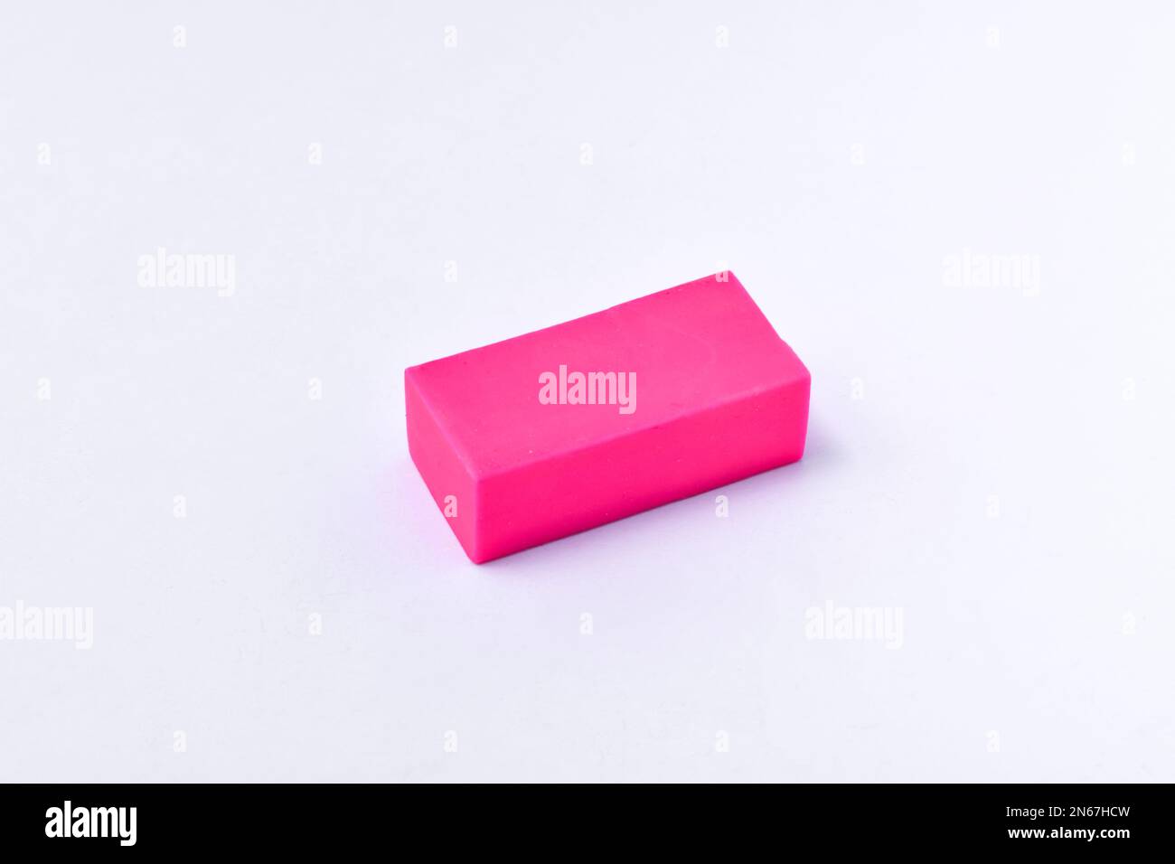 Pink eraser isolated on white background Stock Photo - Alamy
