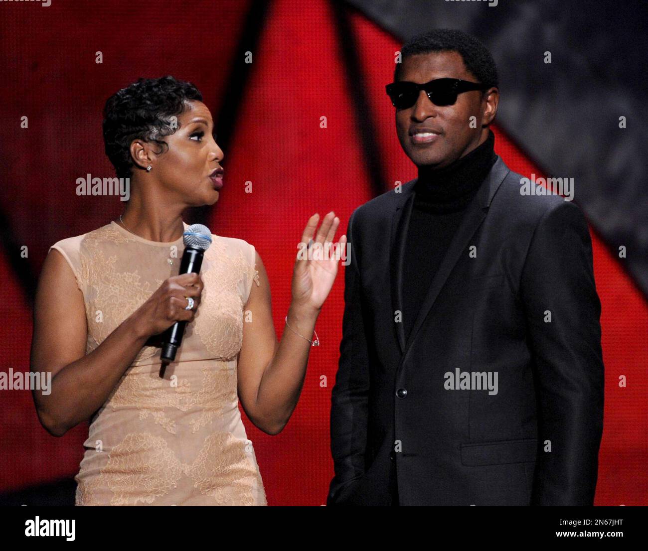 From left, Toni Braxton and Kenneth 'Babyface' Edmonds speak onstage at ...