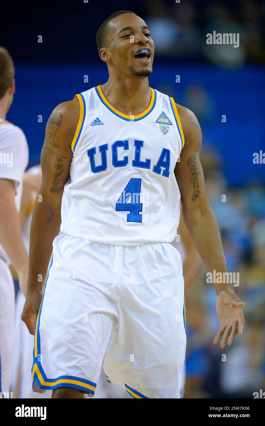 UCLA guard Norman Powell reacts after scoring during the first half of ...