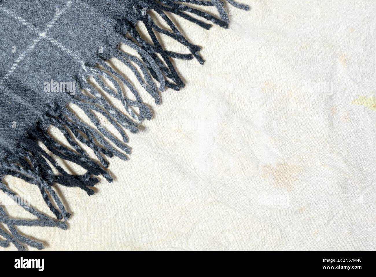 White and black crumpled blanket, texture, background, top view, and ...