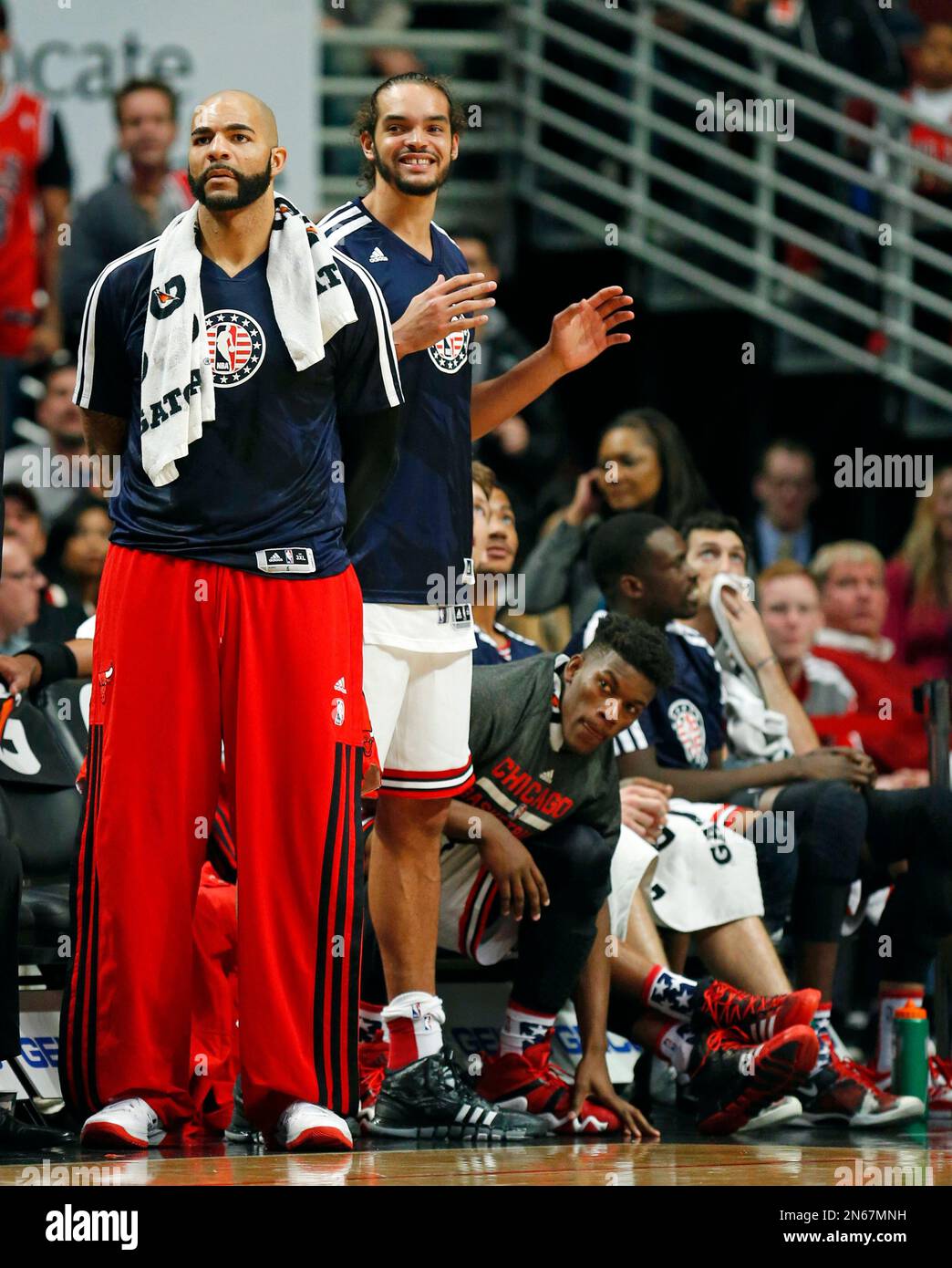 Chicago Bulls players Carlos Boozer, left, Joakim Noah, center and ...