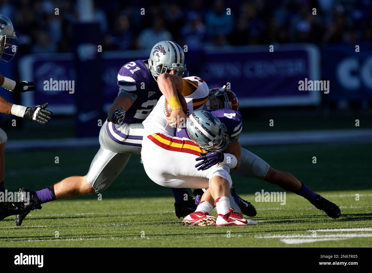 Iowa State quarterback Grant Rohach (3) is hit and knocked down by ...