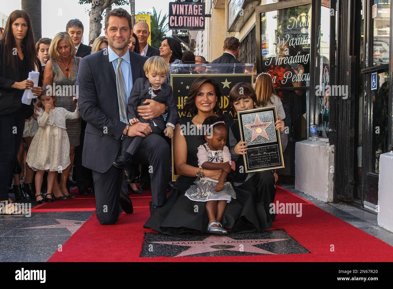Mariska Hargitay poses for a photo with her family, husband Peter ...