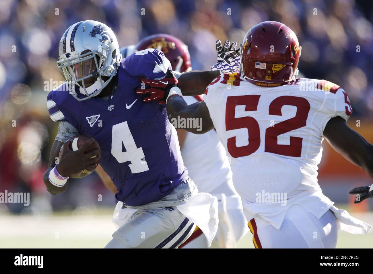 Kansas State quarterback Daniel Sams (4) and Iowa State linebacker ...