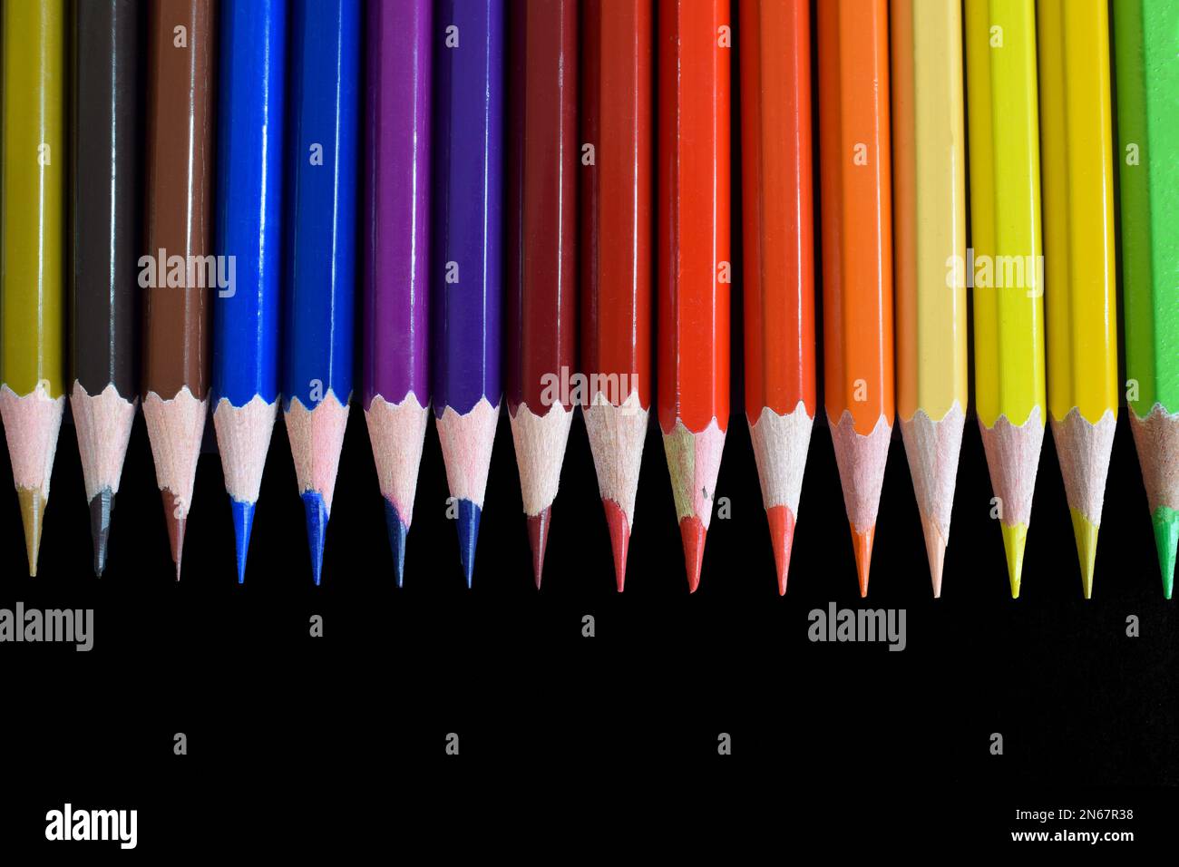 Color pencils isolated on black background. Close up Stock Photo - Alamy