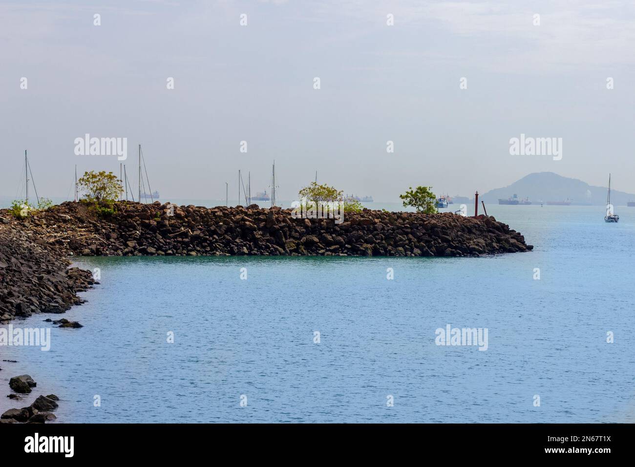 embankment road to an island surrounded by sea Stock Photo - Alamy