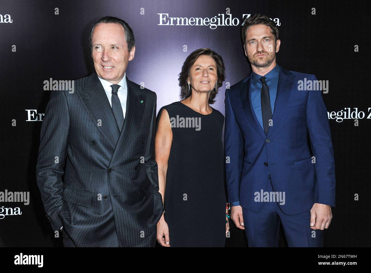 From left, Gildo Zegna, Anna Zegna, and Gerard Butler arrive at the ...