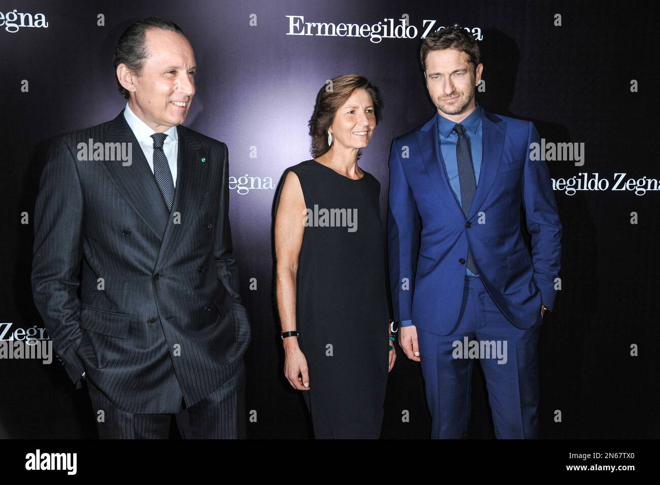 From left, Gildo Zegna, Anna Zegna, and Gerard Butler arrive at the ...