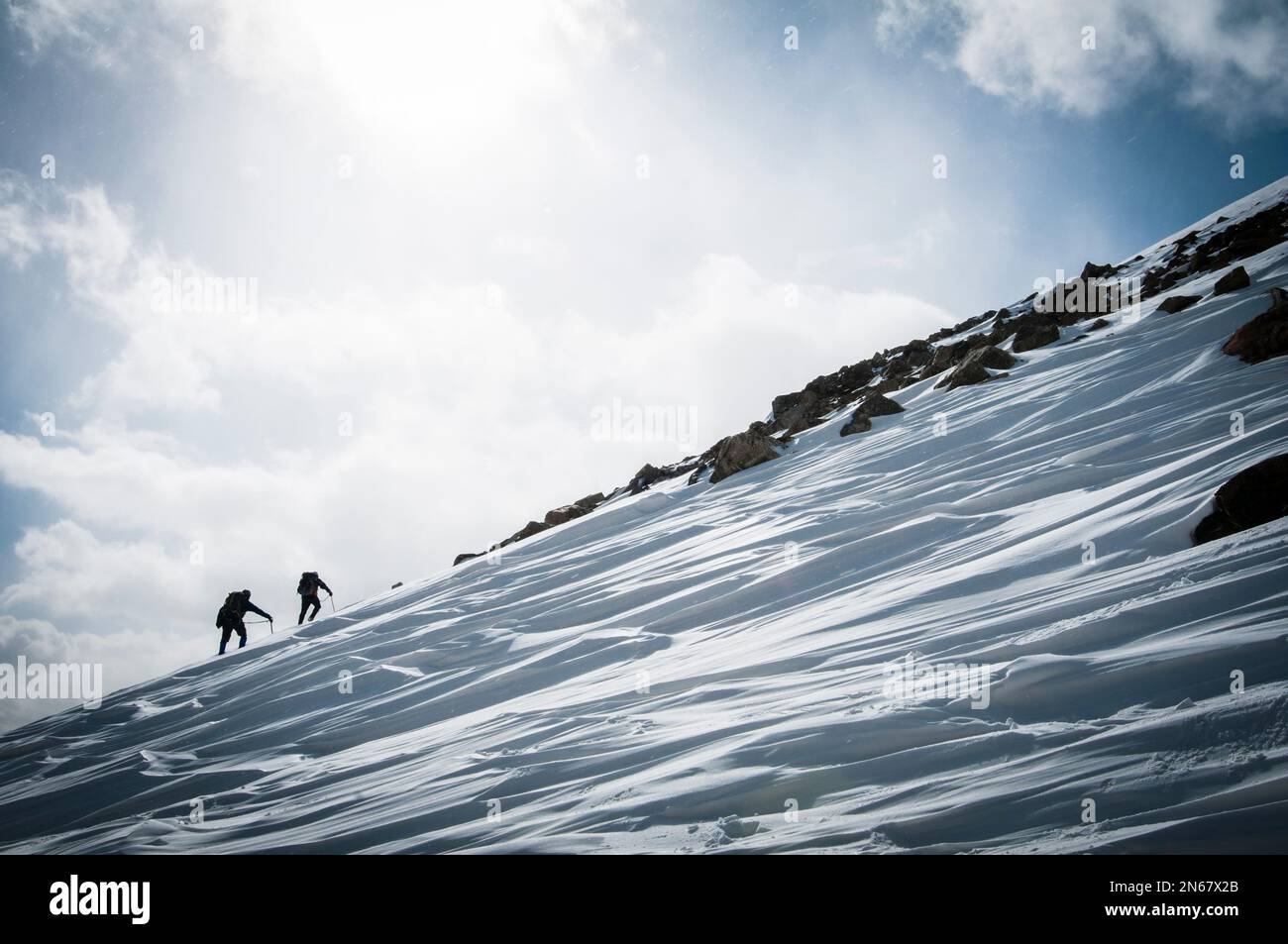 2 men mountain climbing up St. Marys Glacier in Colorado Stock Photo ...