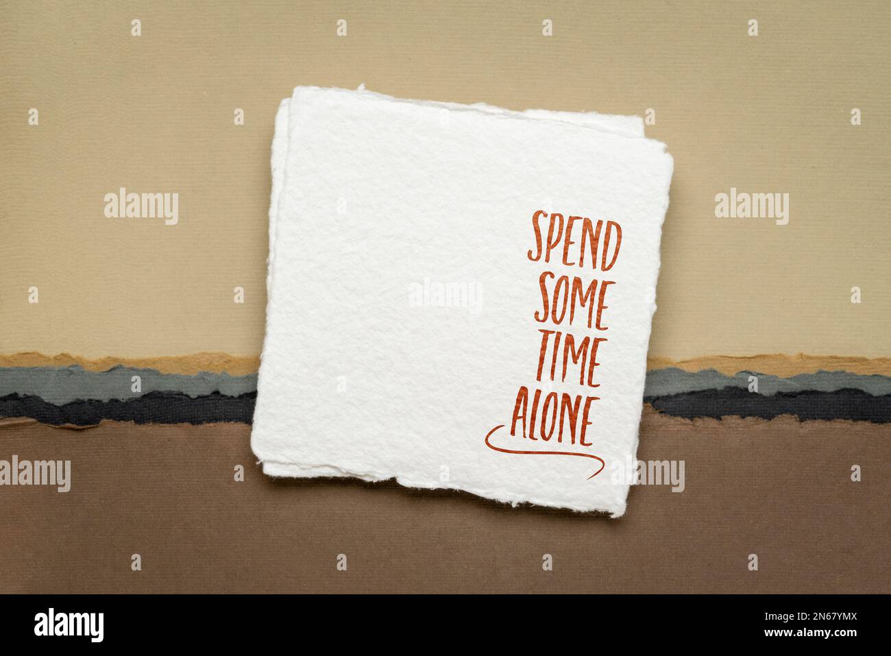 spend some time alone, inspirational advice handwritten on an art paper ...