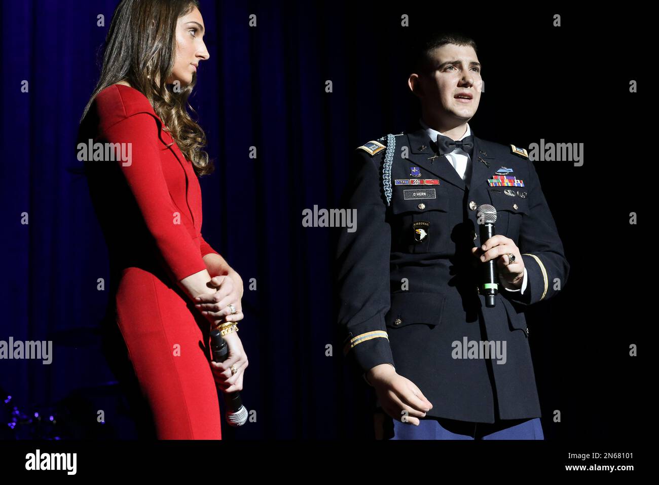 Army Captain Larkin O'Hern, right, and his wife Rachel O'Hern speak at ...