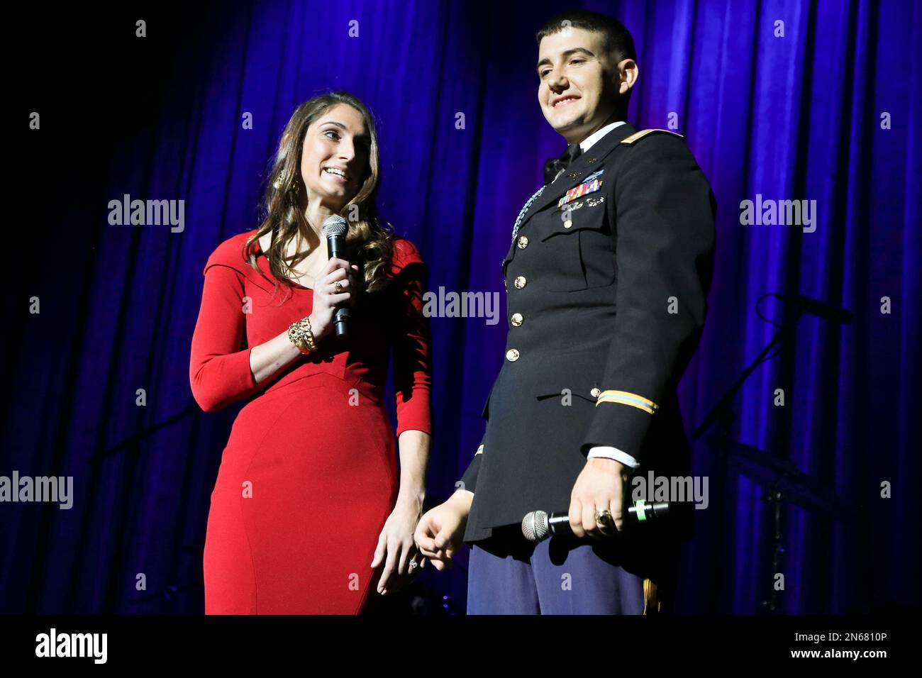 Army Captain Larkin O'Hern, right, and his wife Rachel O'Hern speak at ...