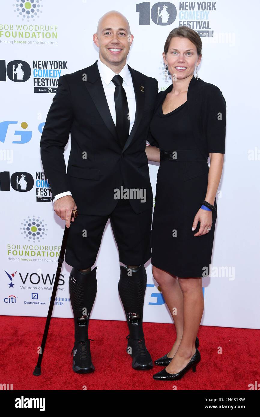 Army Staff Sergeant Brian Mast, left, and his wife Briana Mast arrive ...