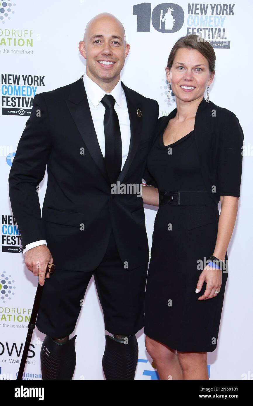 Army Staff Sergeant Brian Mast, left, and his wife Briana Mast arrive ...