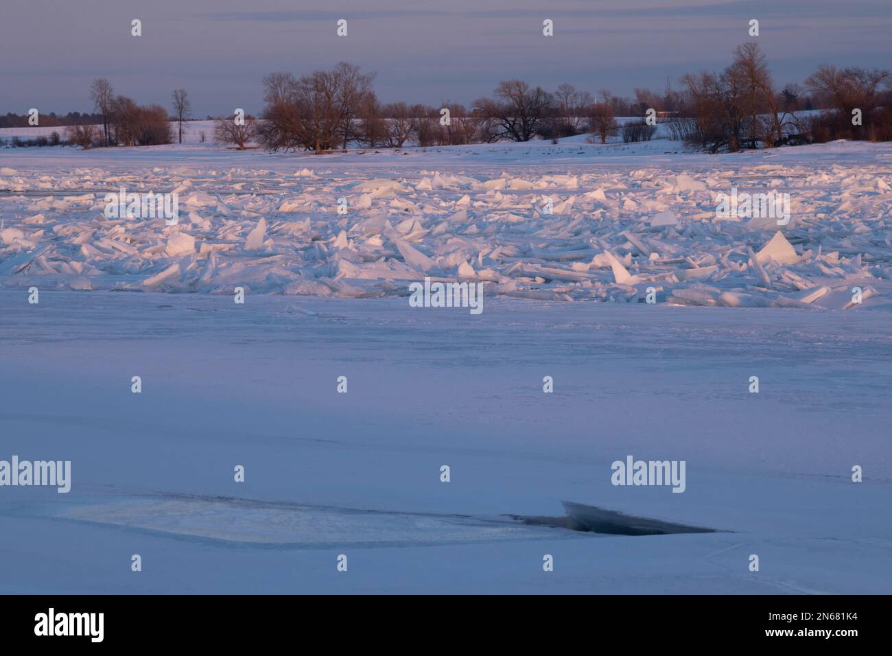 The Saint Lawrence River frozen over with big chunks of ice, winter ...