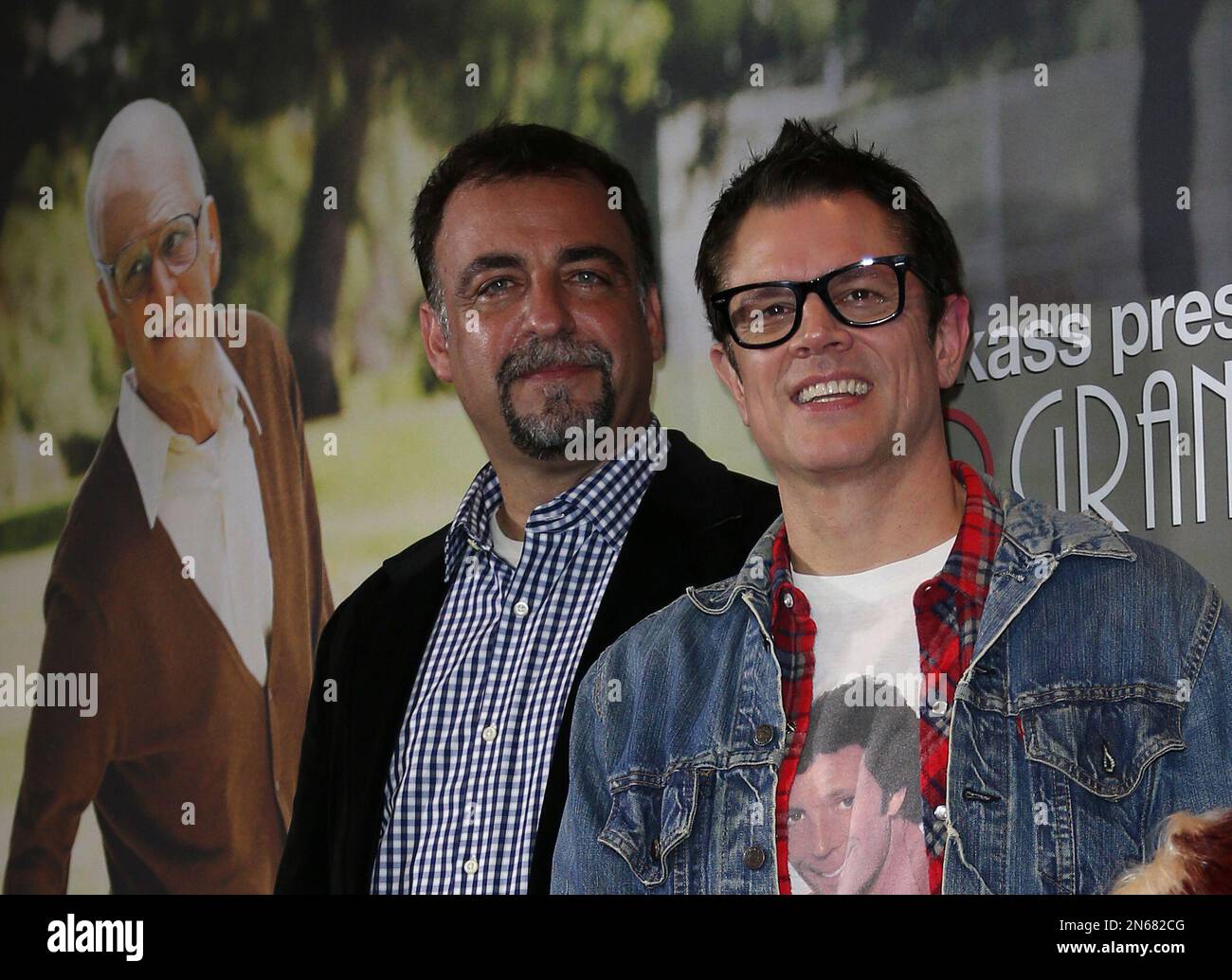 Actor Johnny Knoxville, right, and producer Derek Freda pose for photos ...