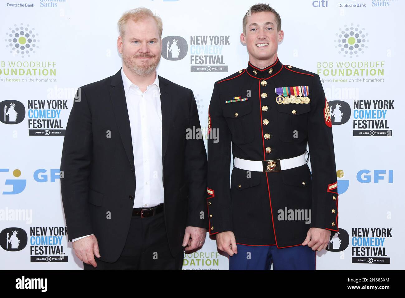 Comedian Jim Gaffigan, left, and Marine Sgt. Evan Stratton arrive at ...