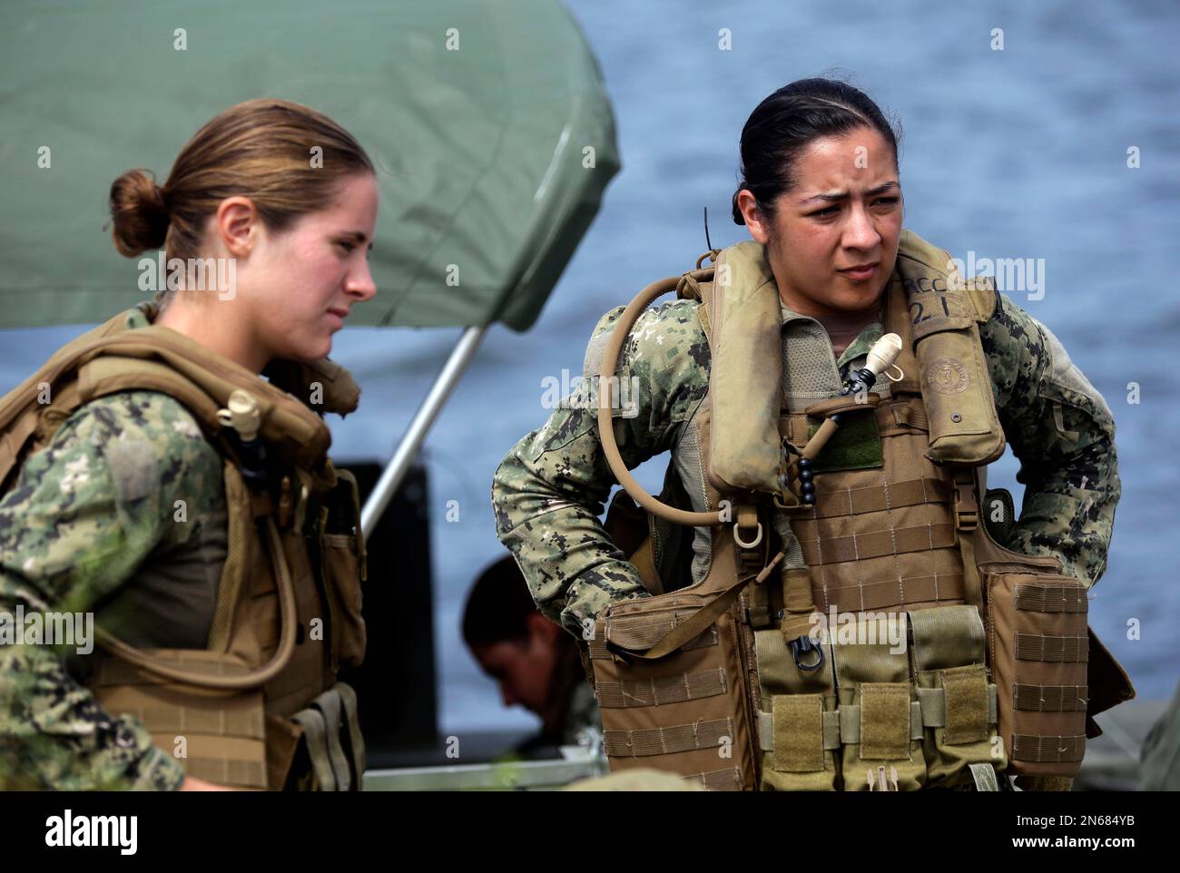 In this Aug. 13, 2013, photo, U.S. Navy Master-at-Arms Third Class ...