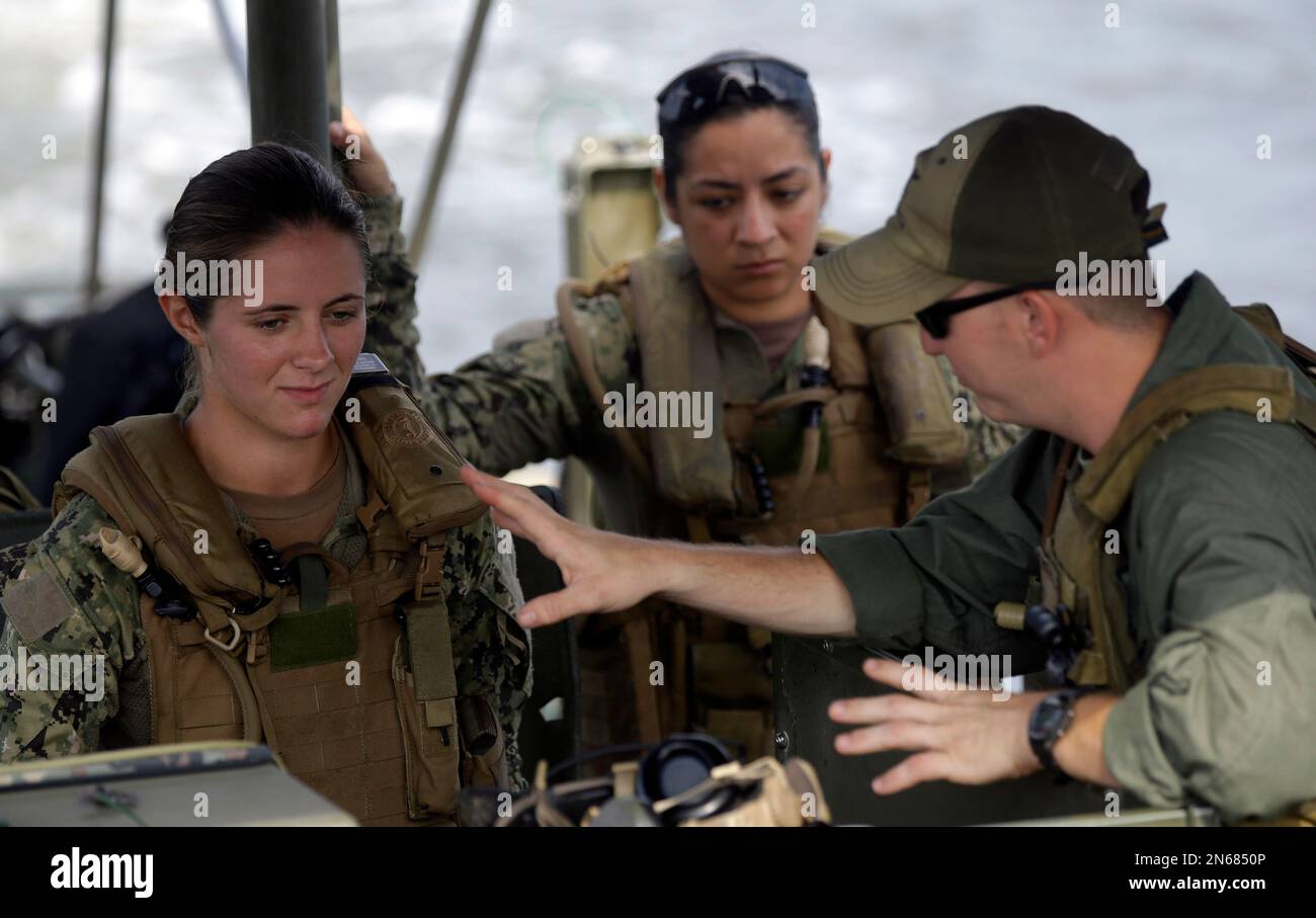 In this photo taken Tuesday, Aug. 13, 2013 U.S. Navy Master-at-Arms ...