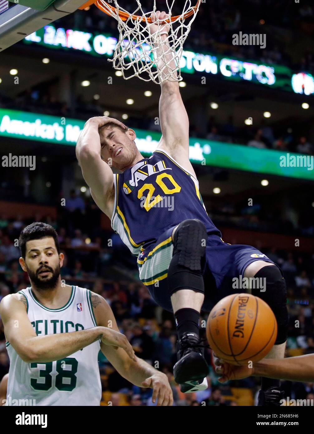 Utah Jazz forward Gordon Hayward (20) holds his head after dunking as ...