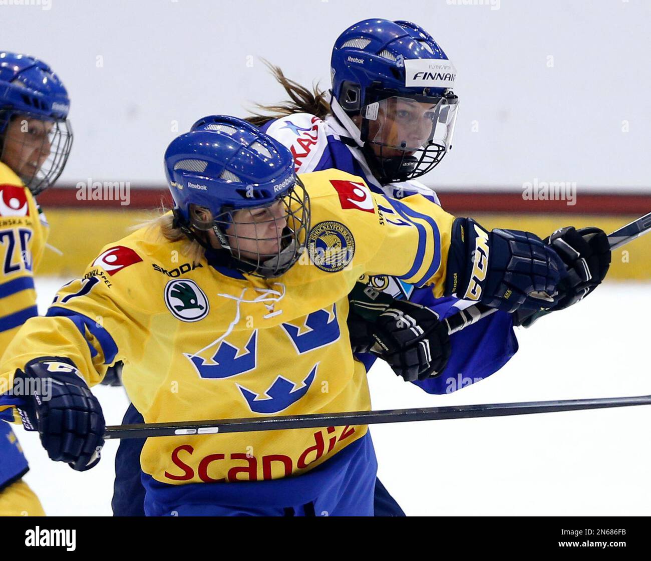 Sweden's Emma Nordin, front, collides with Finland's Susanna Tapani (12 ...