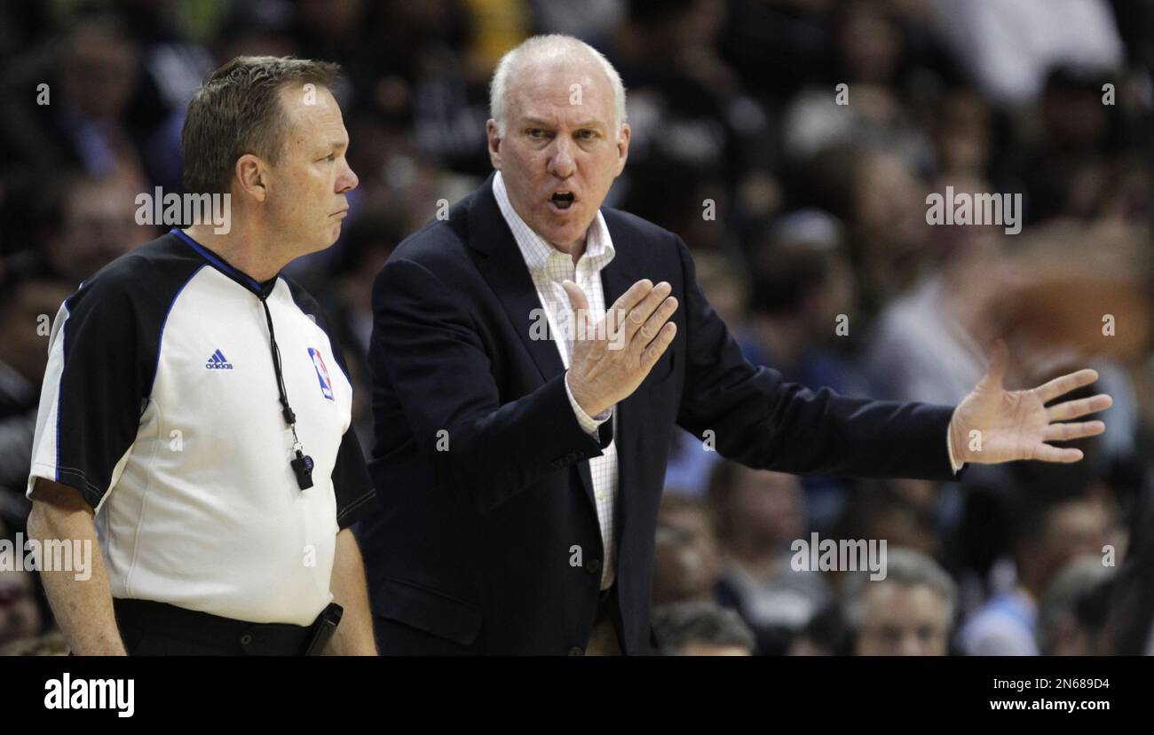 San Antonio Spurs coach Gregg Popovich talks to referee Bill Spooner in ...