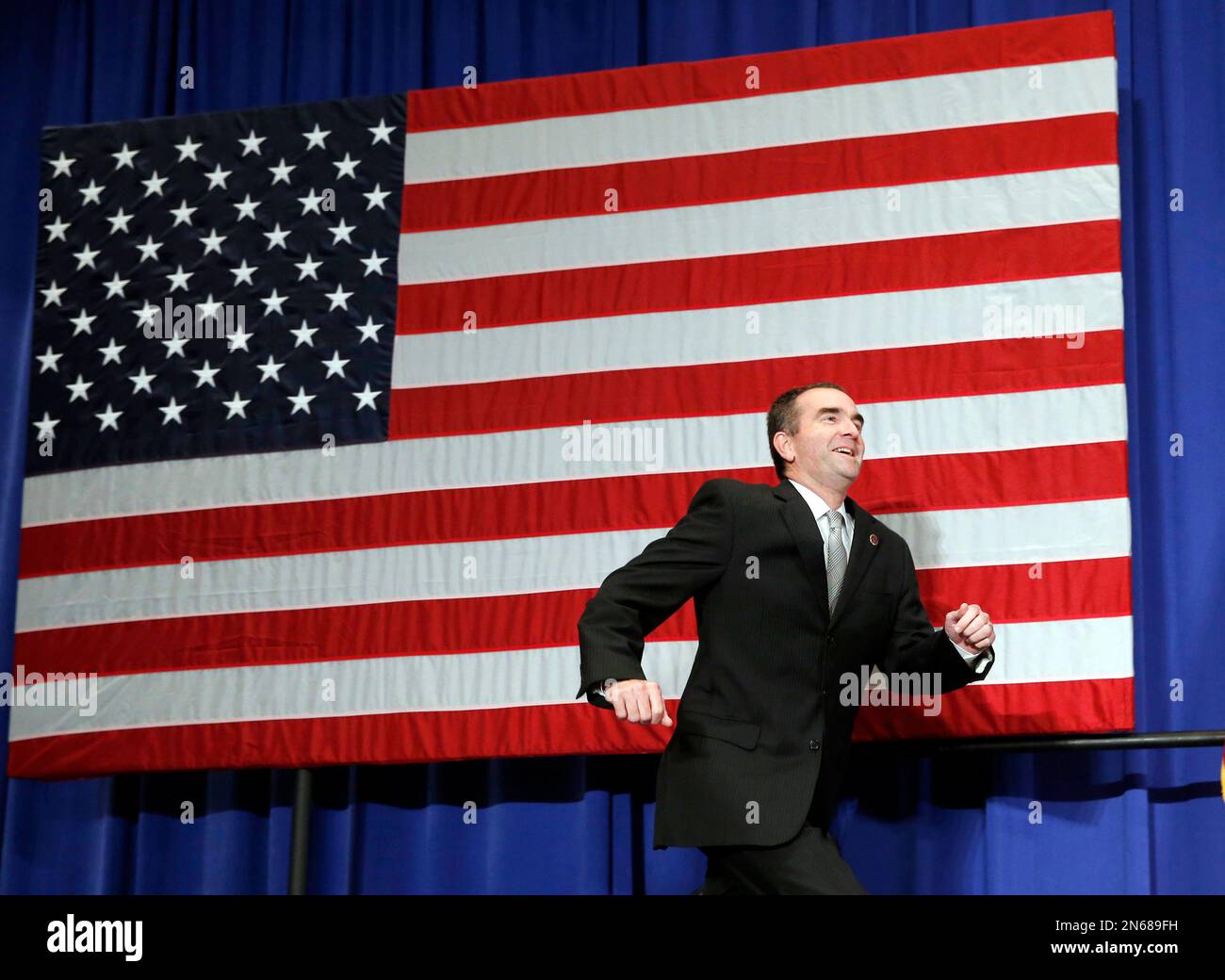 Virginia Democratic Lt. Gov.-elect Ralph Northam takes the stage during ...