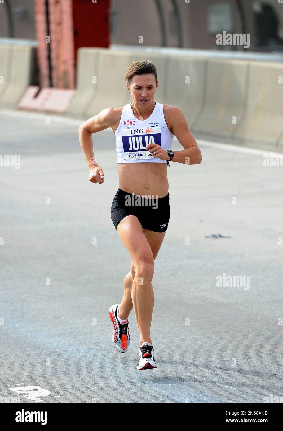 Julia Stamps Mallon of the United States crosses the Pulaski Bridge ...