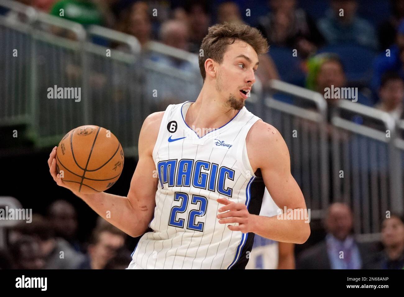 Orlando Magic's Franz Wagner (22) looks to pass the ball against the ...