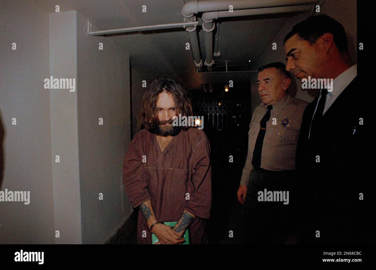 Charles Manson is shown during the time of his arraignment and on his ...
