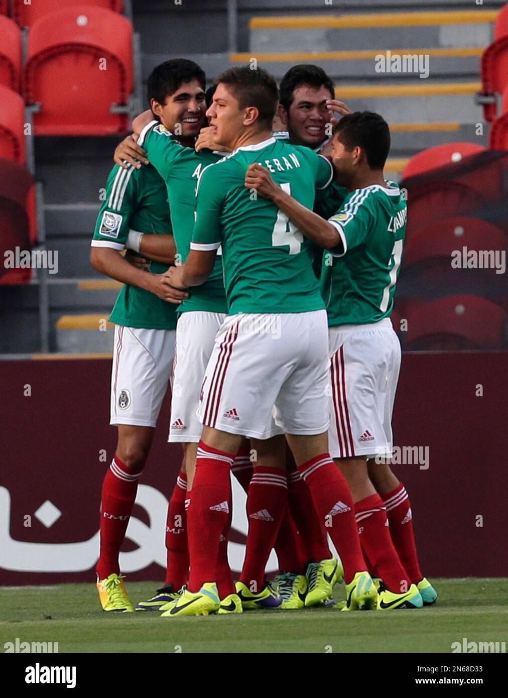 Mexico's Ivan Ochoa, left, celebrates with his teammates after scoring ...
