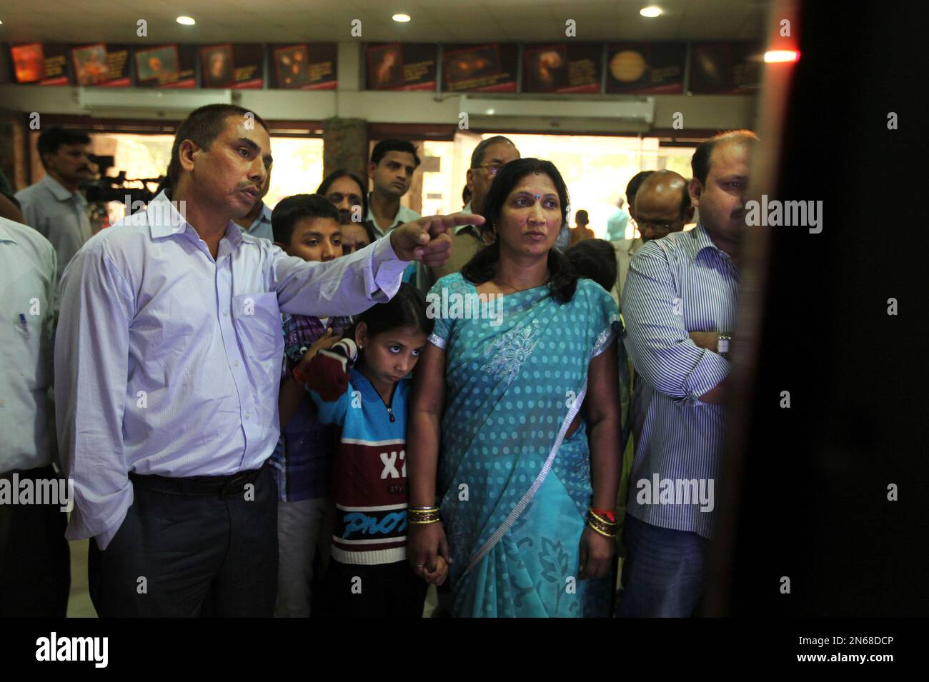 Indians watch the live telecast of the launch of Polar Satellite Launch ...
