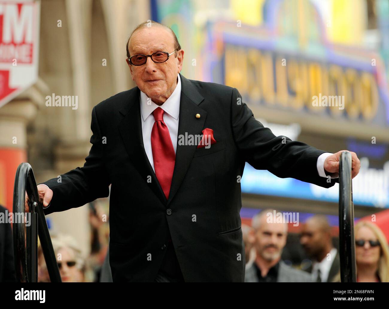 Record industry executive Clive Davis takes the stage at a ceremony ...