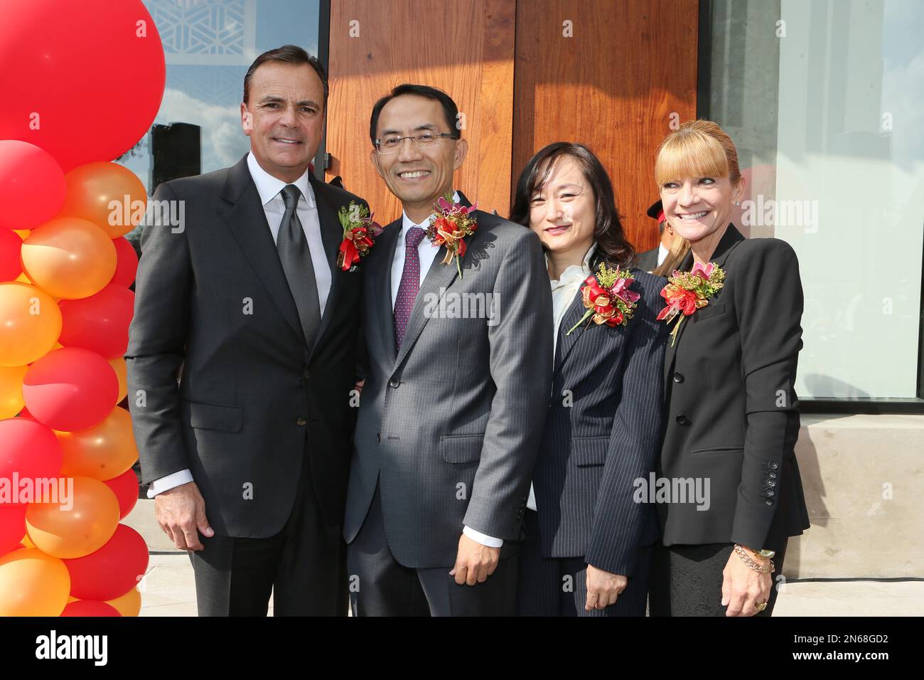 Rick Caruso, Frank Yang, Joanne Yang and Julie Jauregui at the ribbon ...