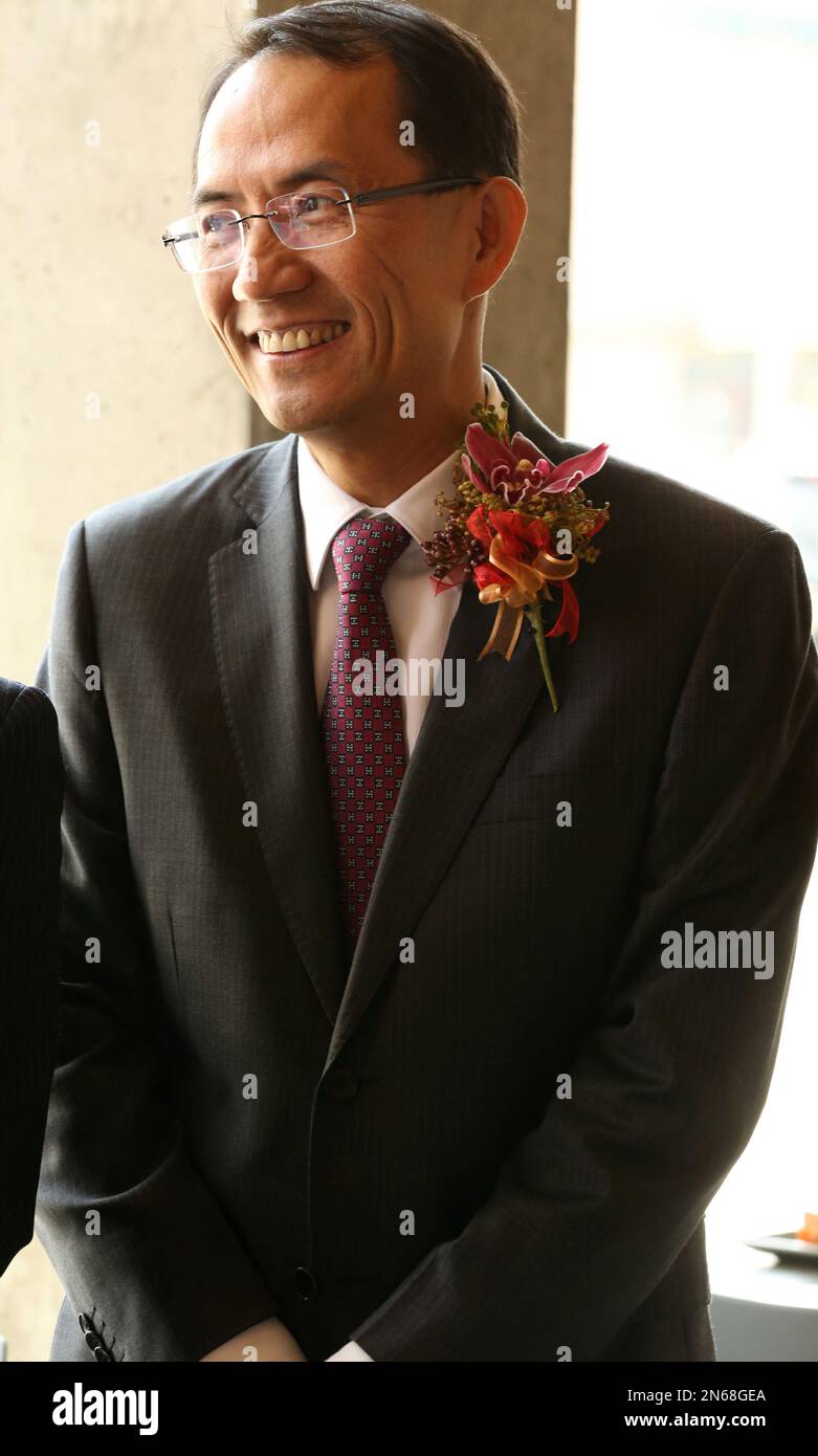 Frank Yang at the ribbon cutting ceremony for the grand opening of Din ...