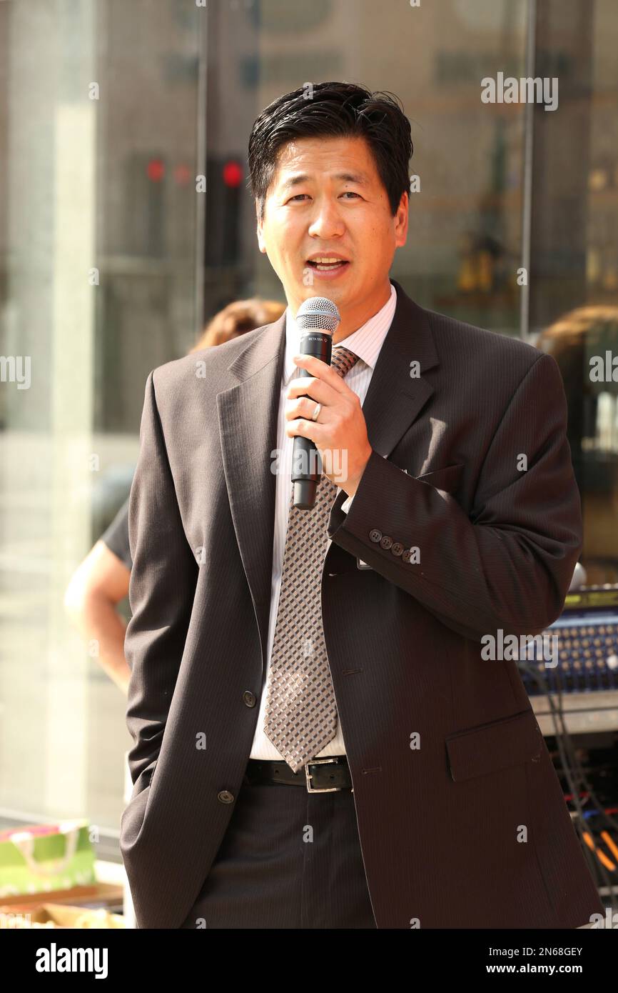 Fred Lie at the ribbon cutting ceremony for the grand opening of Din ...