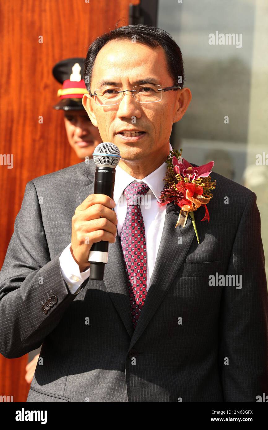 Frank Yang at the ribbon cutting ceremony for the grand opening of Din ...