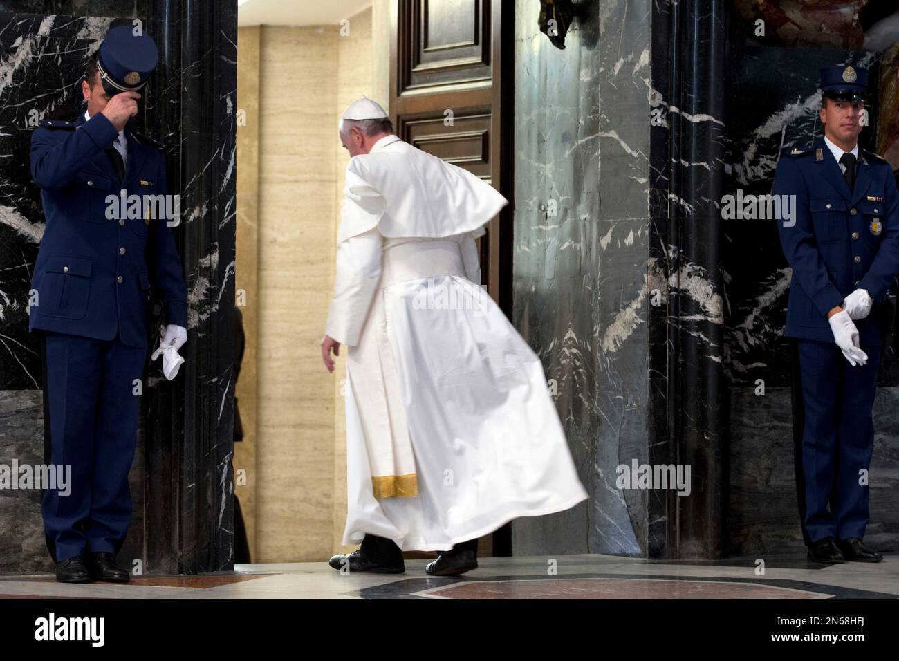 Vatican Gendarmerie guards salute Pope Francis as he leaves St. Peter's ...