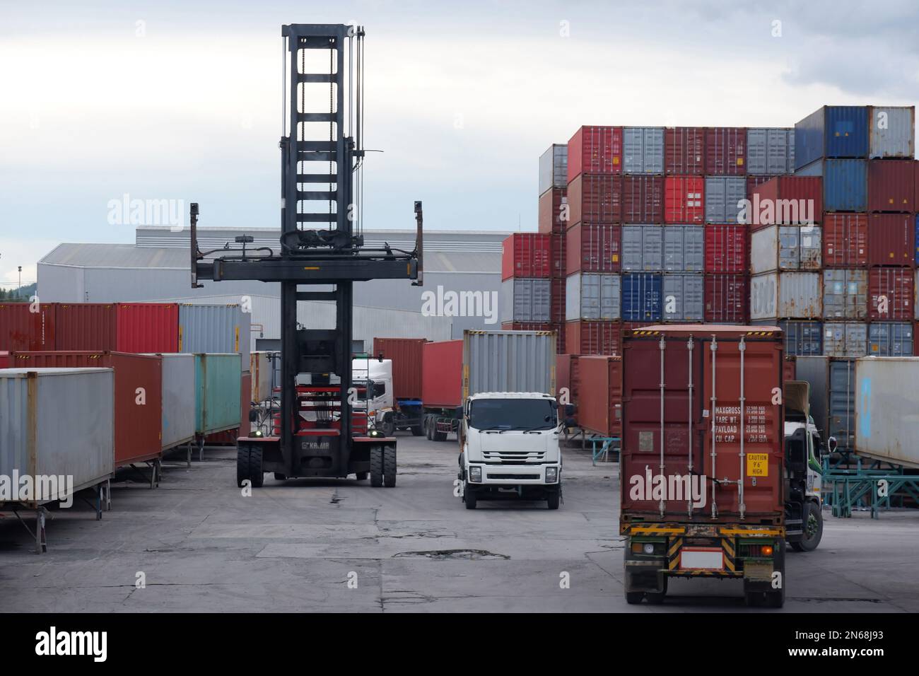 container forklift in the container yard Stock Photo - Alamy