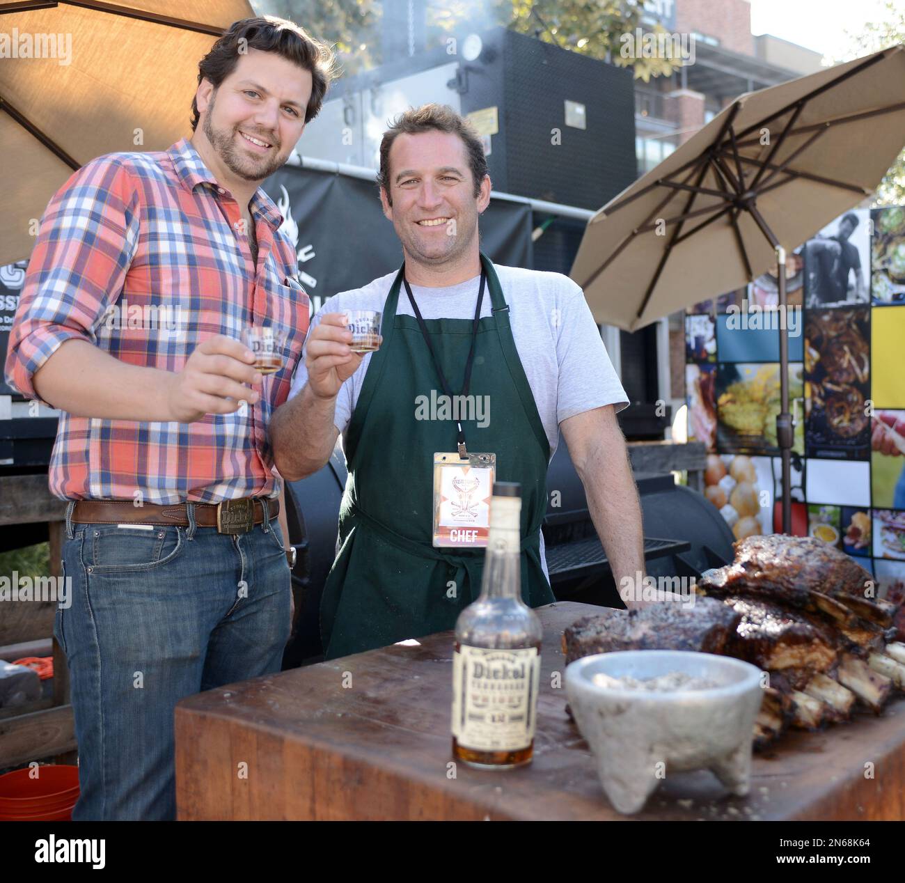 George Dickel brand ambassador Doug Kragel, left, toasts with barbecue ...
