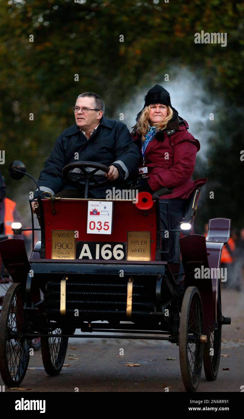 Participants drive their 1900 English Mechanic car at the start line in ...