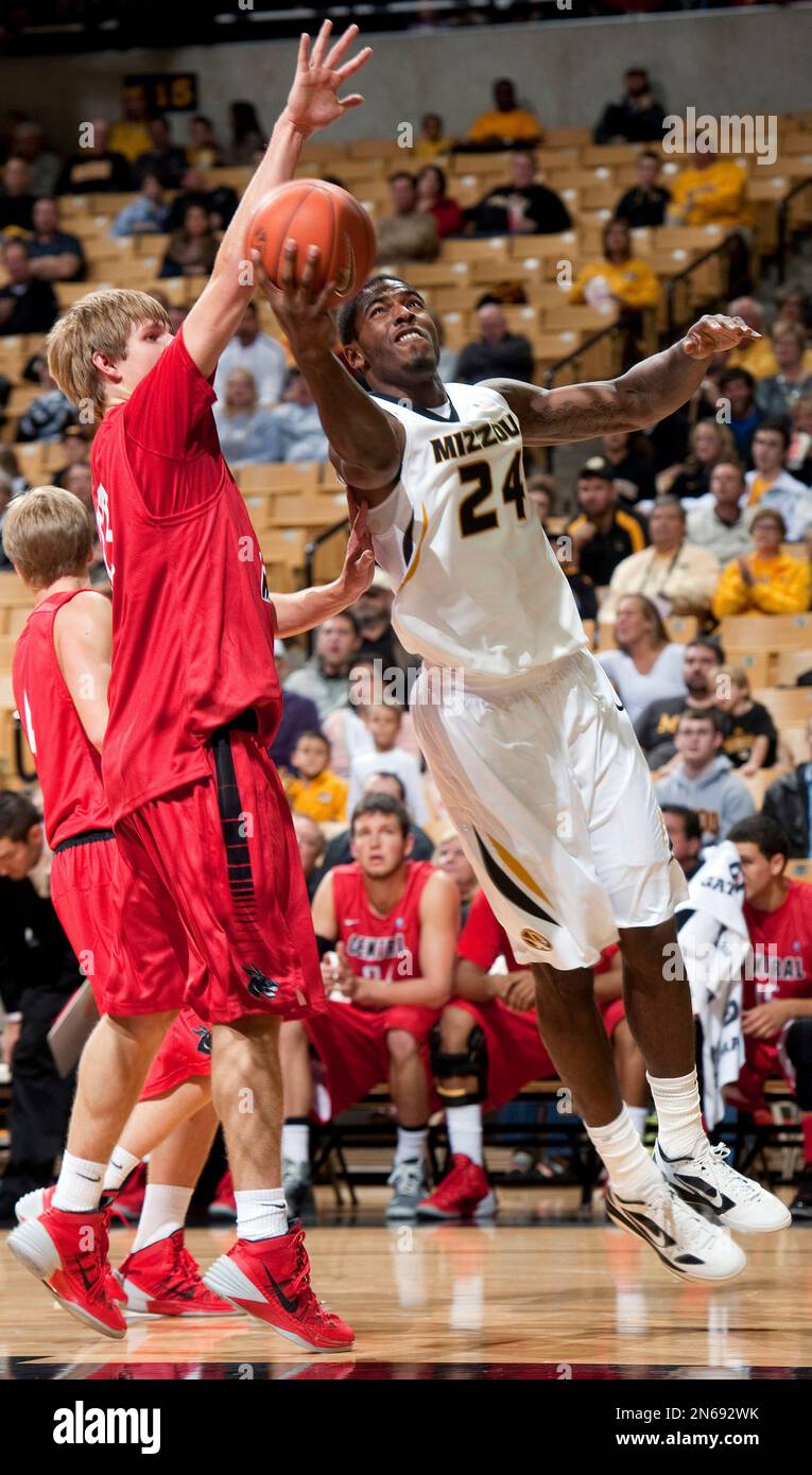 Missouri's Torren Jones, right, shoots past Central Missouri's Kyle ...