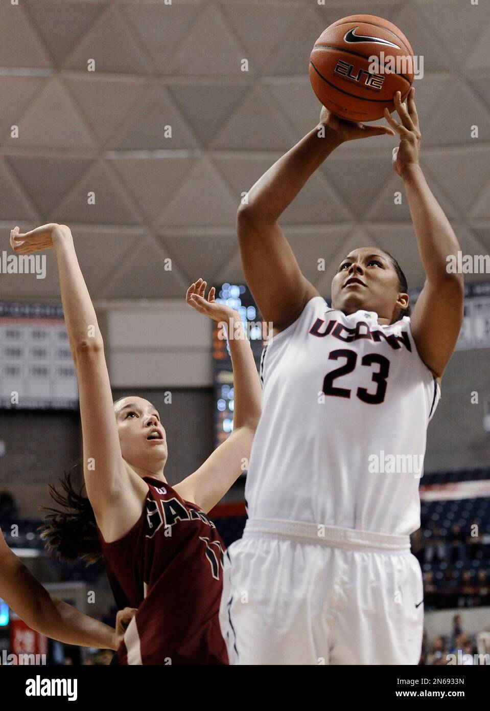 Connecticut's Kaleena Mosqueda-Lewis, right, shoots over Gannon's Jen ...