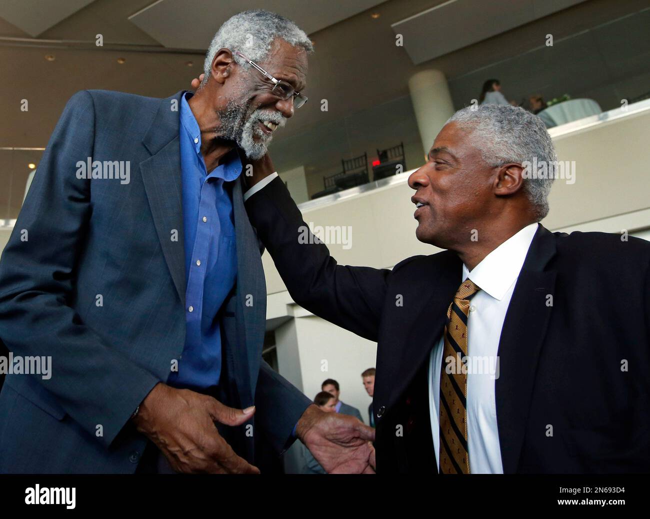 Julius Erving, right, former Philadelphia 76ers basketball great ...