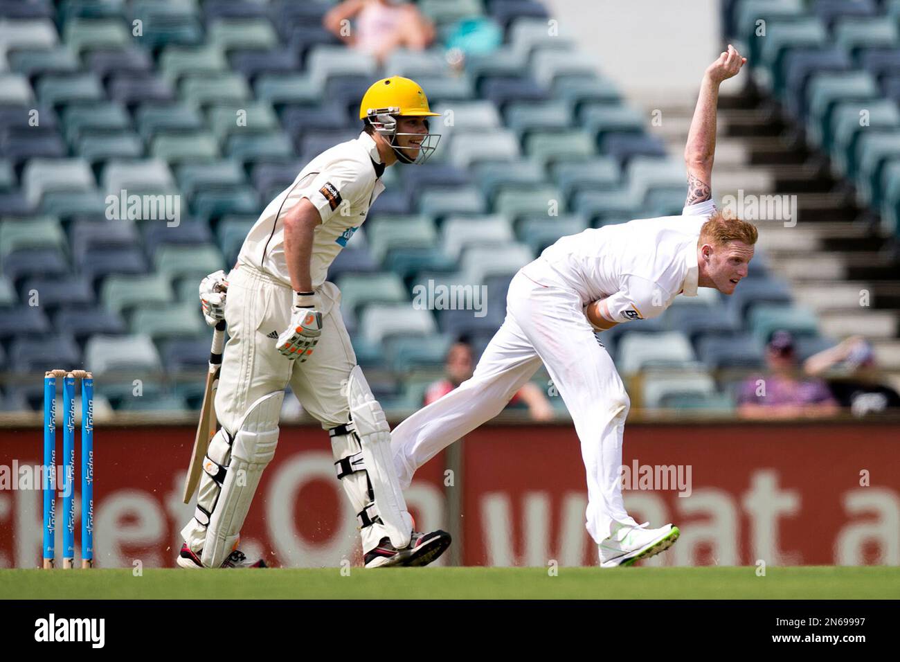 England's Ben Stokes bowls during their tour cricket match against ...