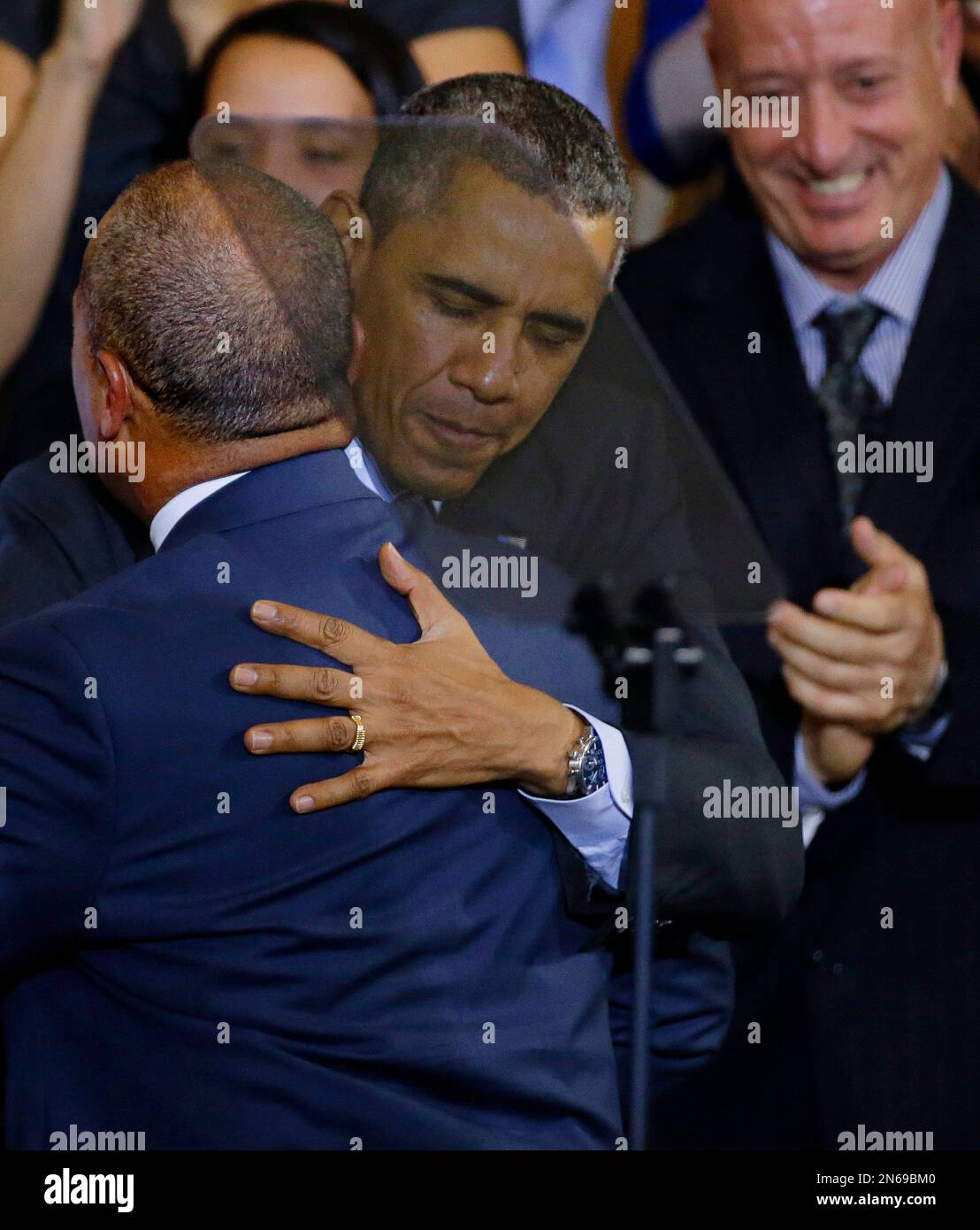 President Barack Obama hugs his friend Massachusetts Gov. Deval Patrick ...