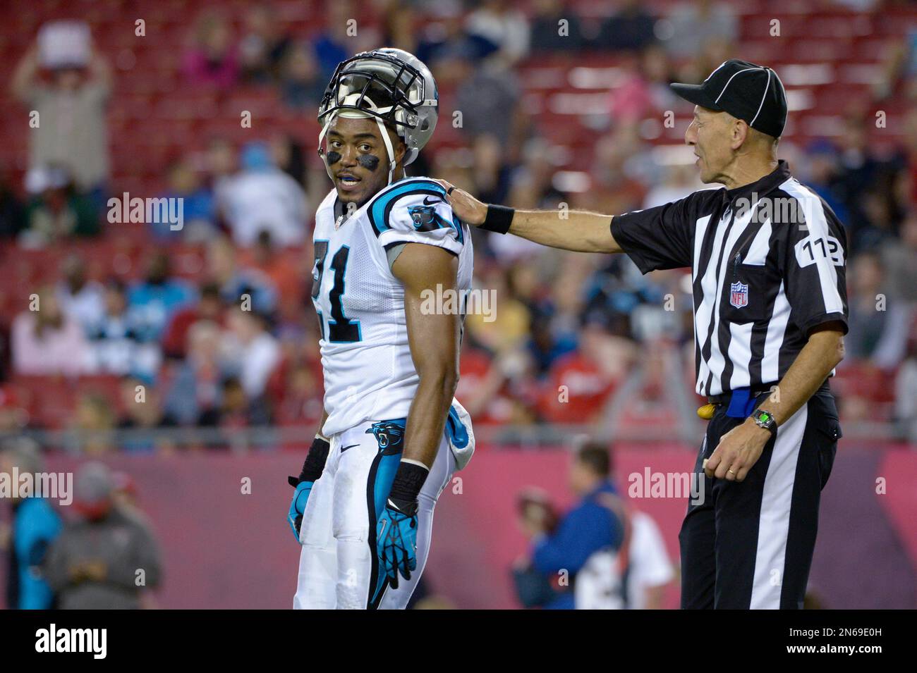 Carolina Panthers free safety Mike Mitchell (21) talks with back judge Tony Steratore after a ...