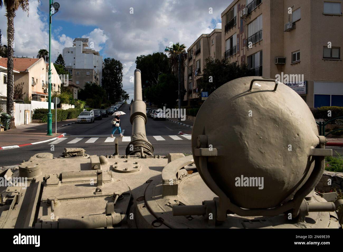 In this photo taken Sunday, Sept. 22, 2013, an Israeli woman crosses a ...